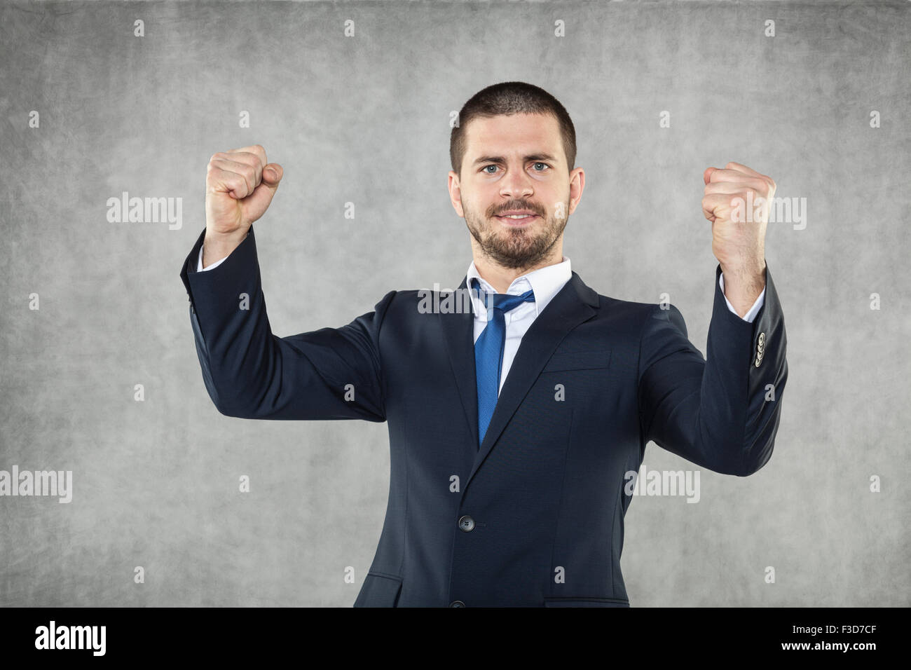 Cheerful businessman celebrating successful investment hi-res stock ...