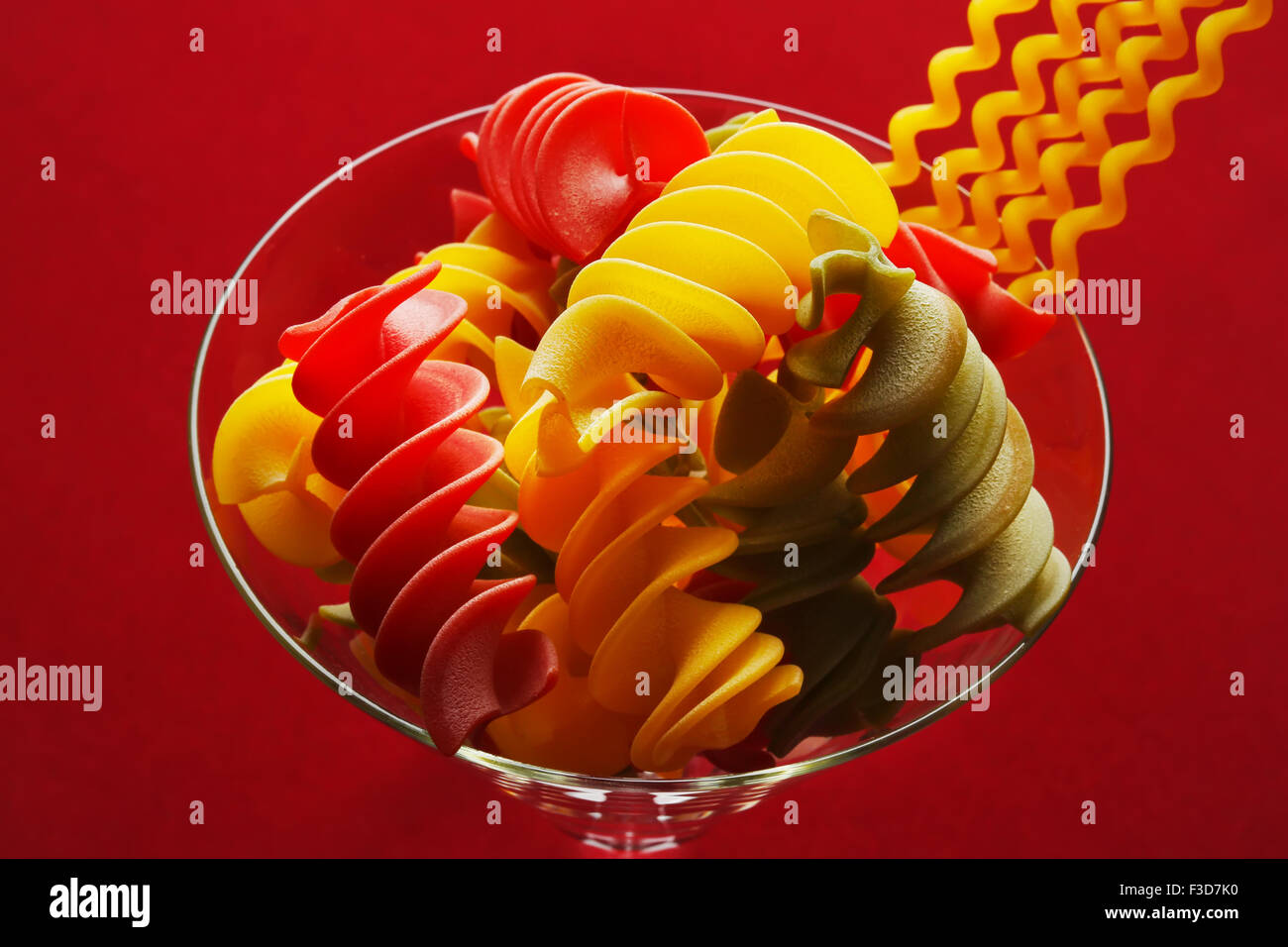 Spiral italian pasta in a glass Stock Photo - Alamy