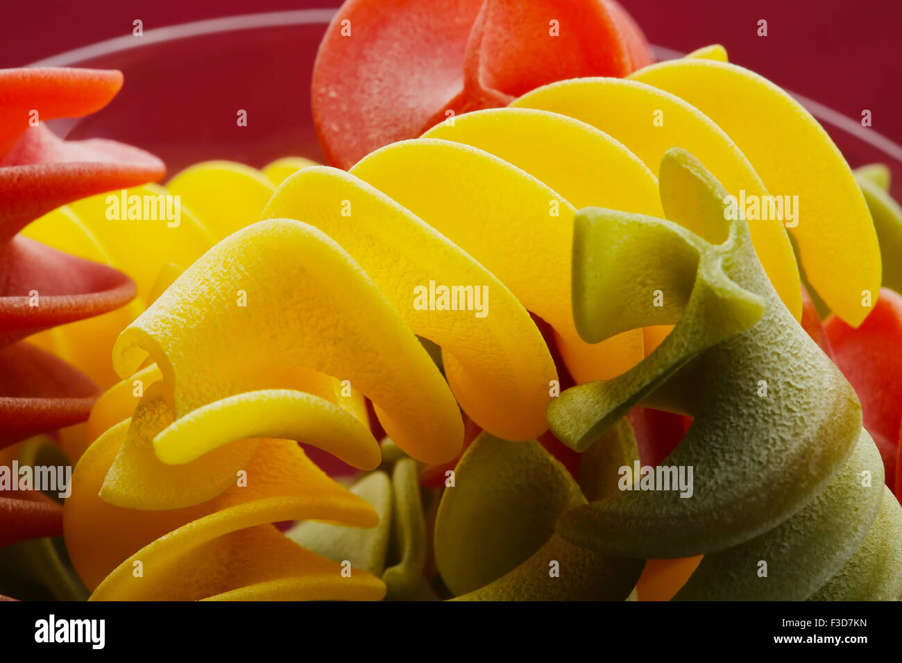 Spiral italian pasta in a glass Stock Photo - Alamy