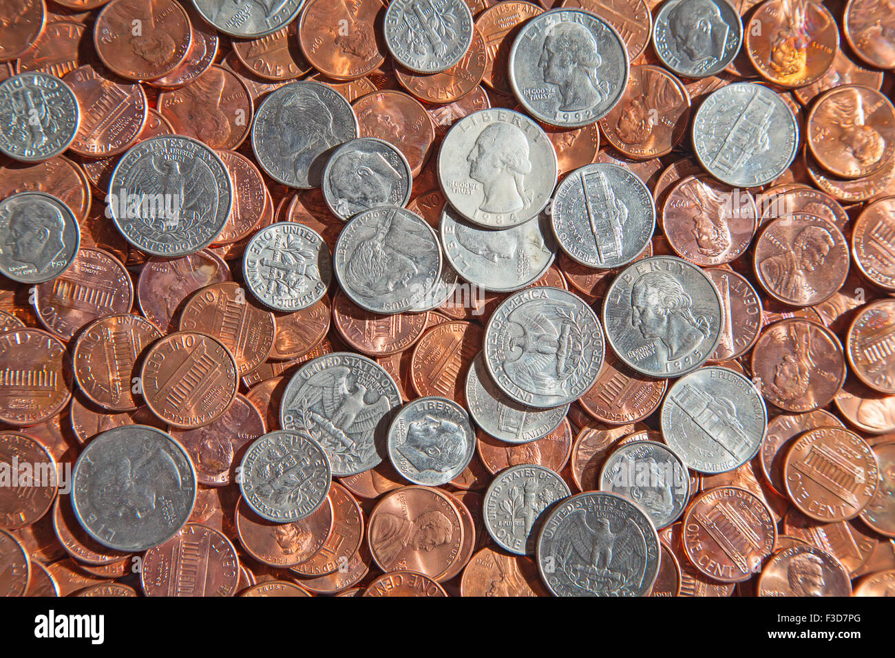 Huge pile of the US coins Stock Photo - Alamy