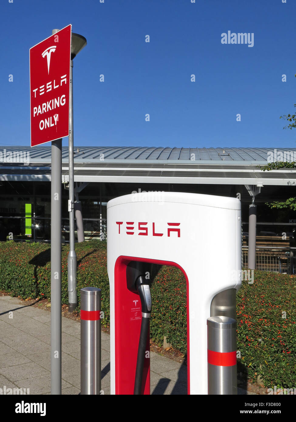 Tesla Car Charging Point Motorway Stock Photos & Tesla Car Charging ...