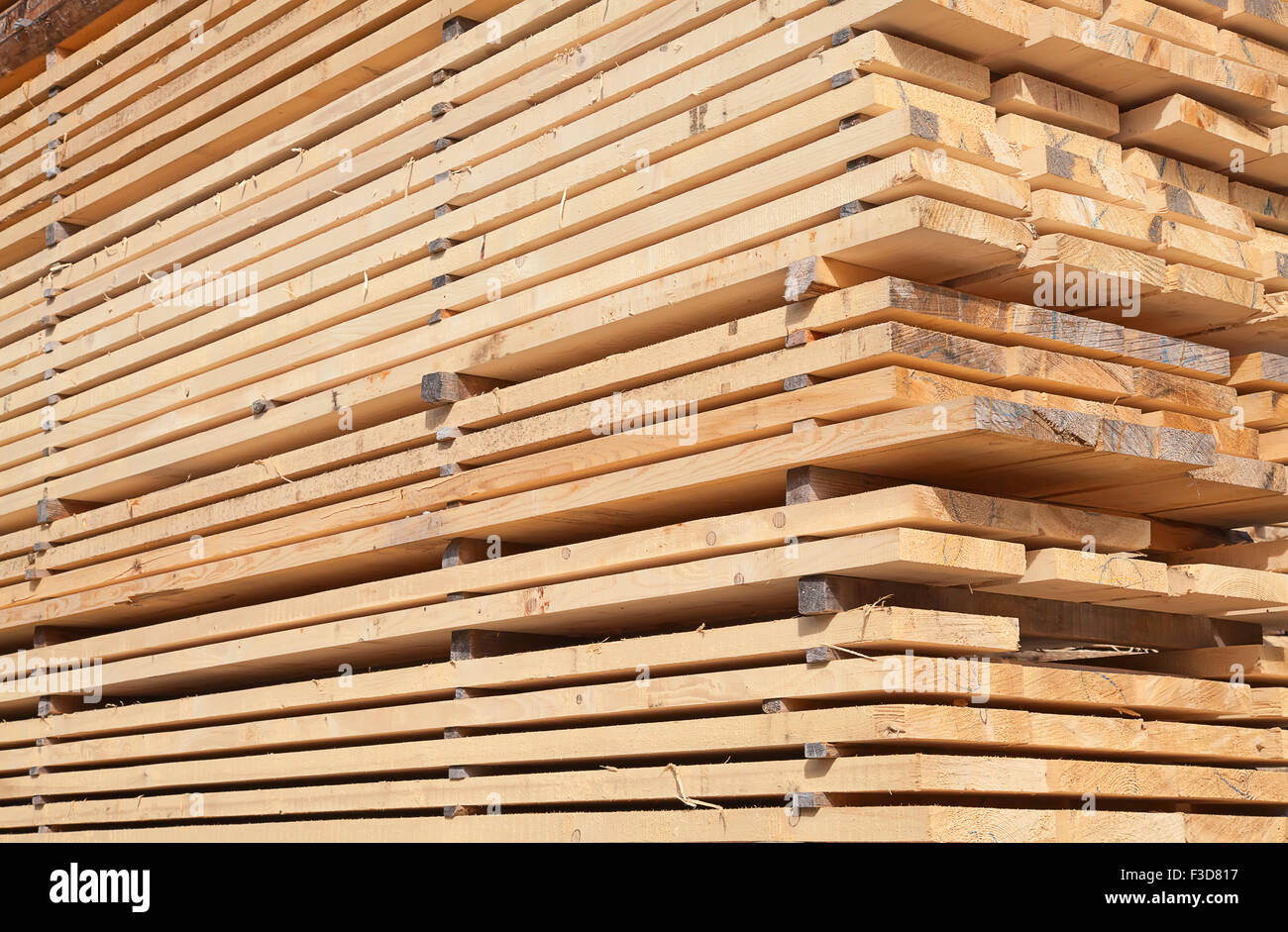 Stack of new wooden studs at the lumber yard Stock Photo - Alamy