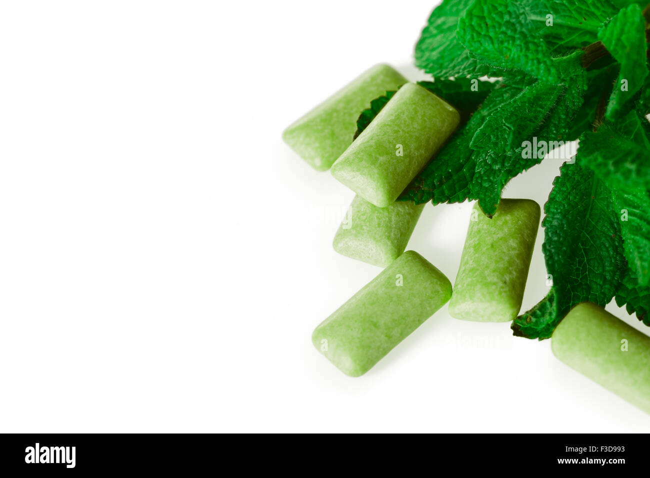 green chewing gum on white - food and drink Stock Photo - Alamy