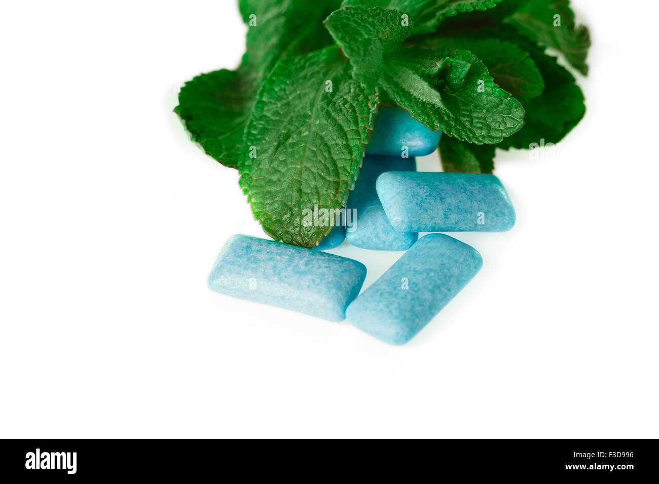 blue chewing gum on white - food and drink Stock Photo - Alamy