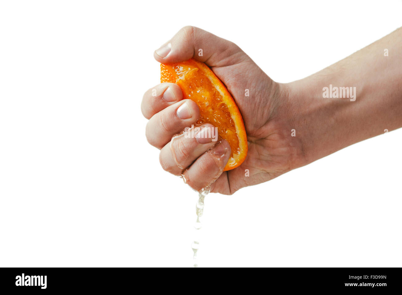 man dramatic squeezes orange. Concept squeezed a man is tired from work ...