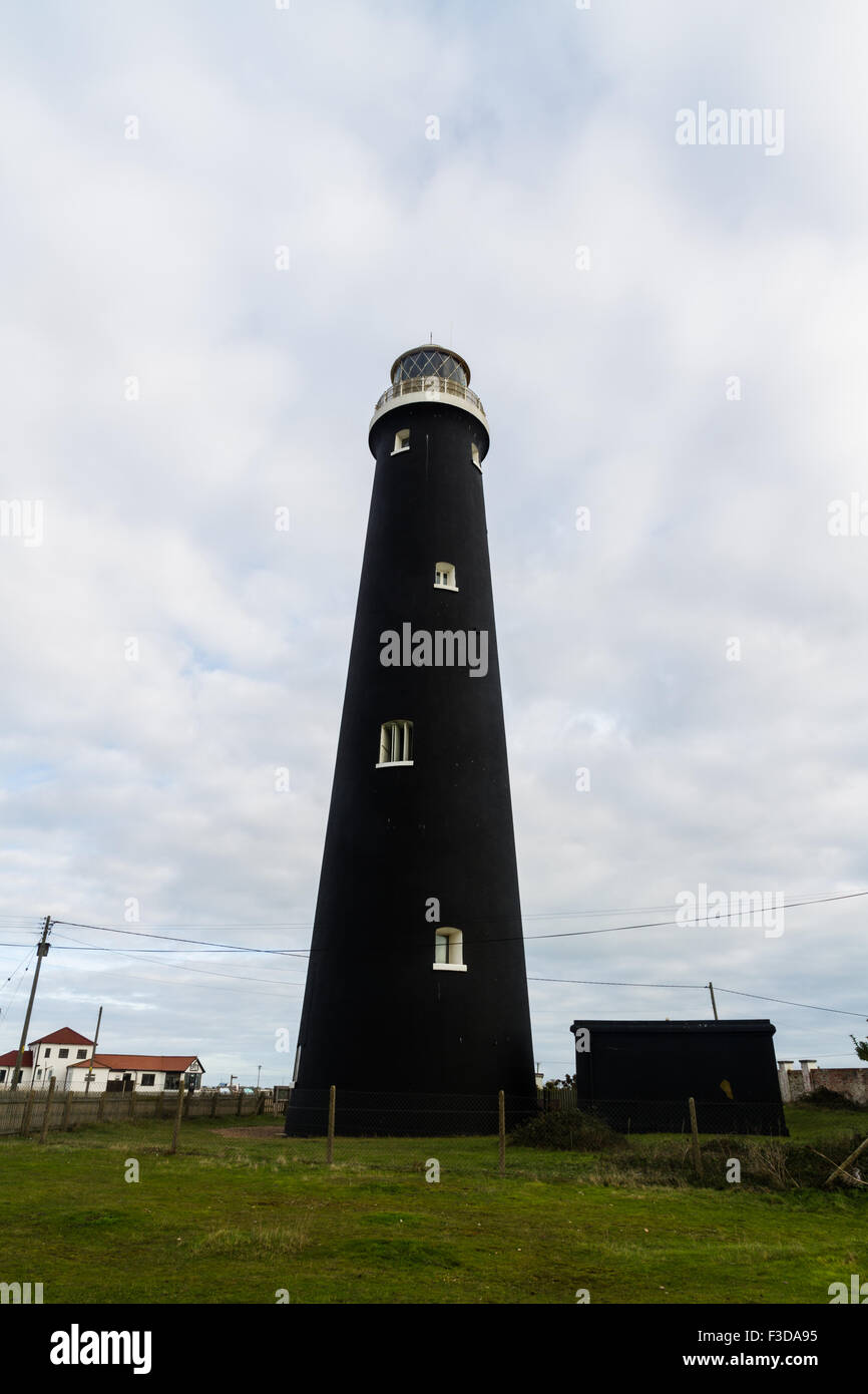 Black lighthouse. Dungeness Old Lighthouse, Kent, England, United ...
