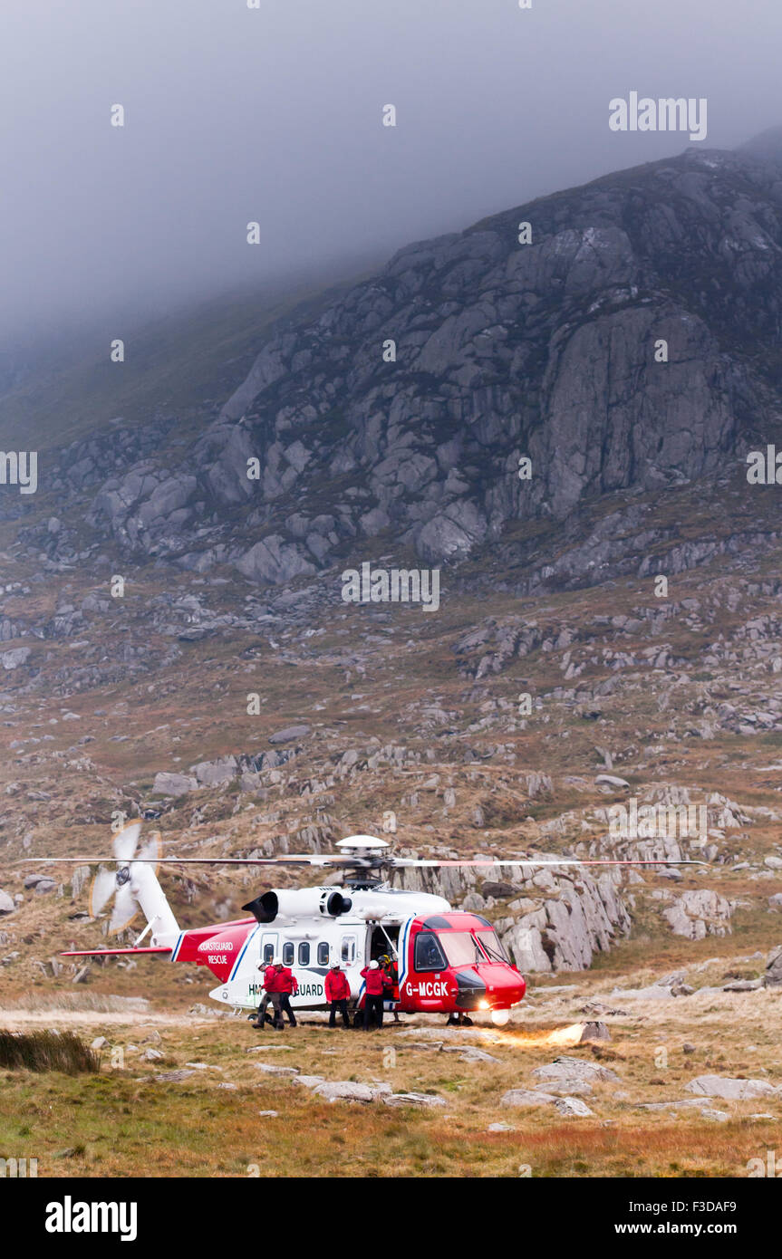 As dusk falls, Ogwen Valley Mountain Rescue Organisation and the ...