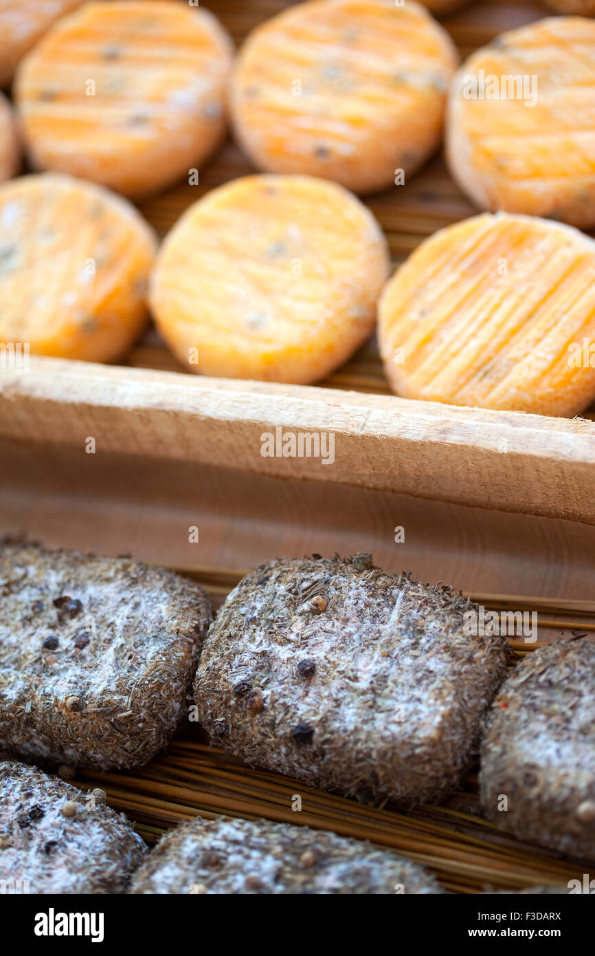 Goat cheese in wooden boxes on a market stall Stock Photo - Alamy