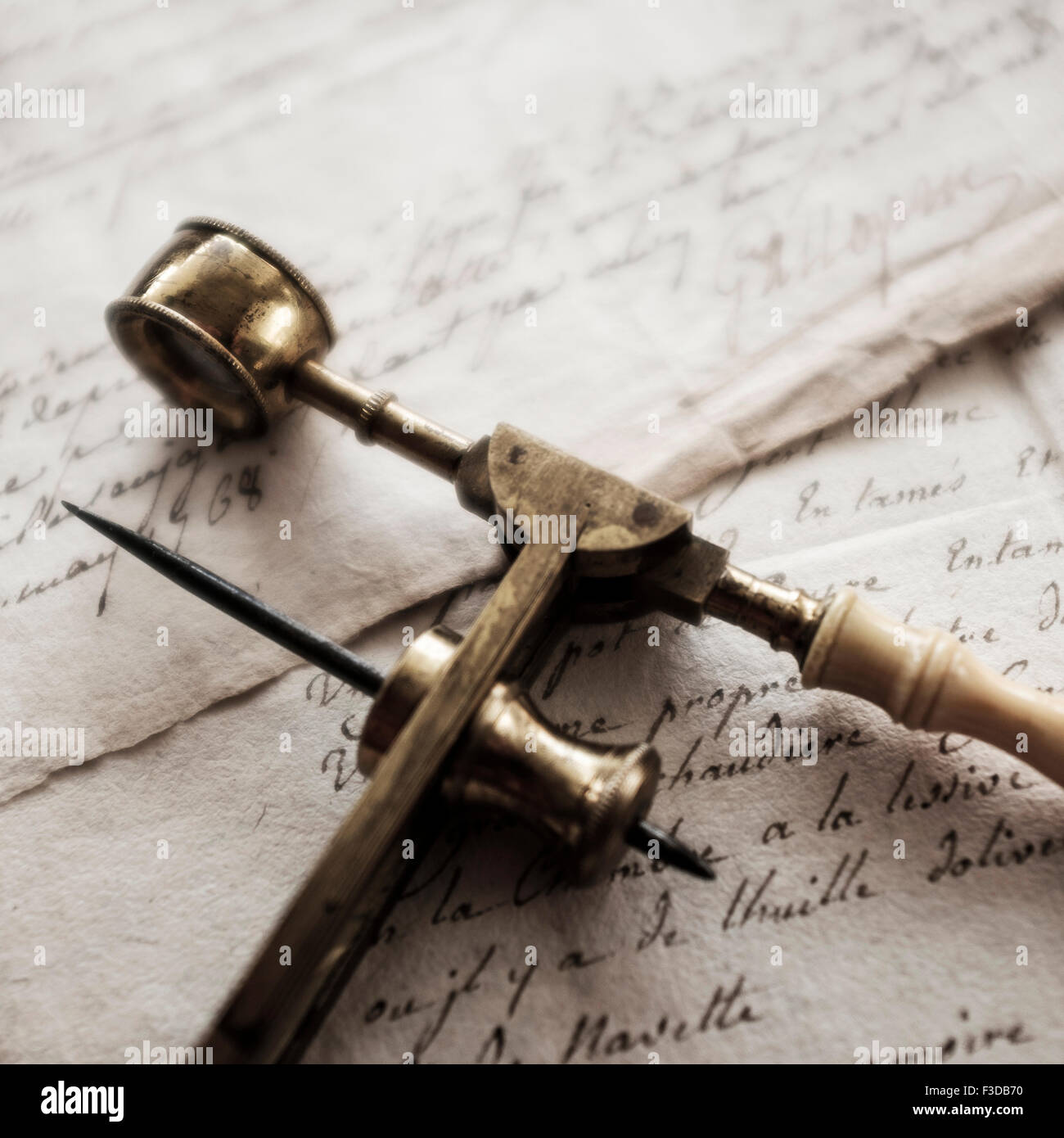 Antique microscope and letters Stock Photo - Alamy