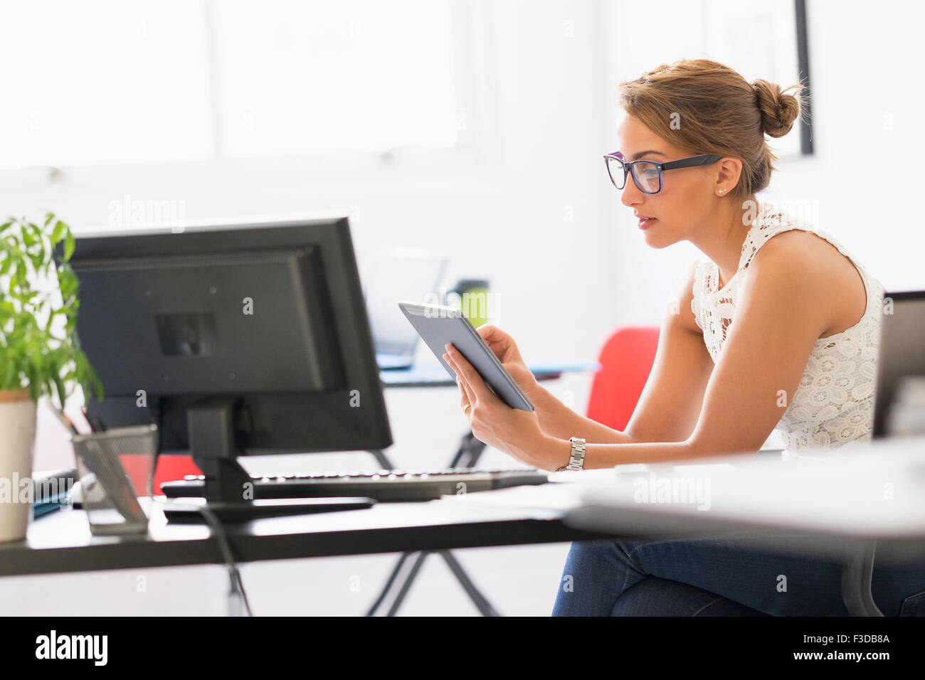 Back view businesswoman working digital hi-res stock photography and ...