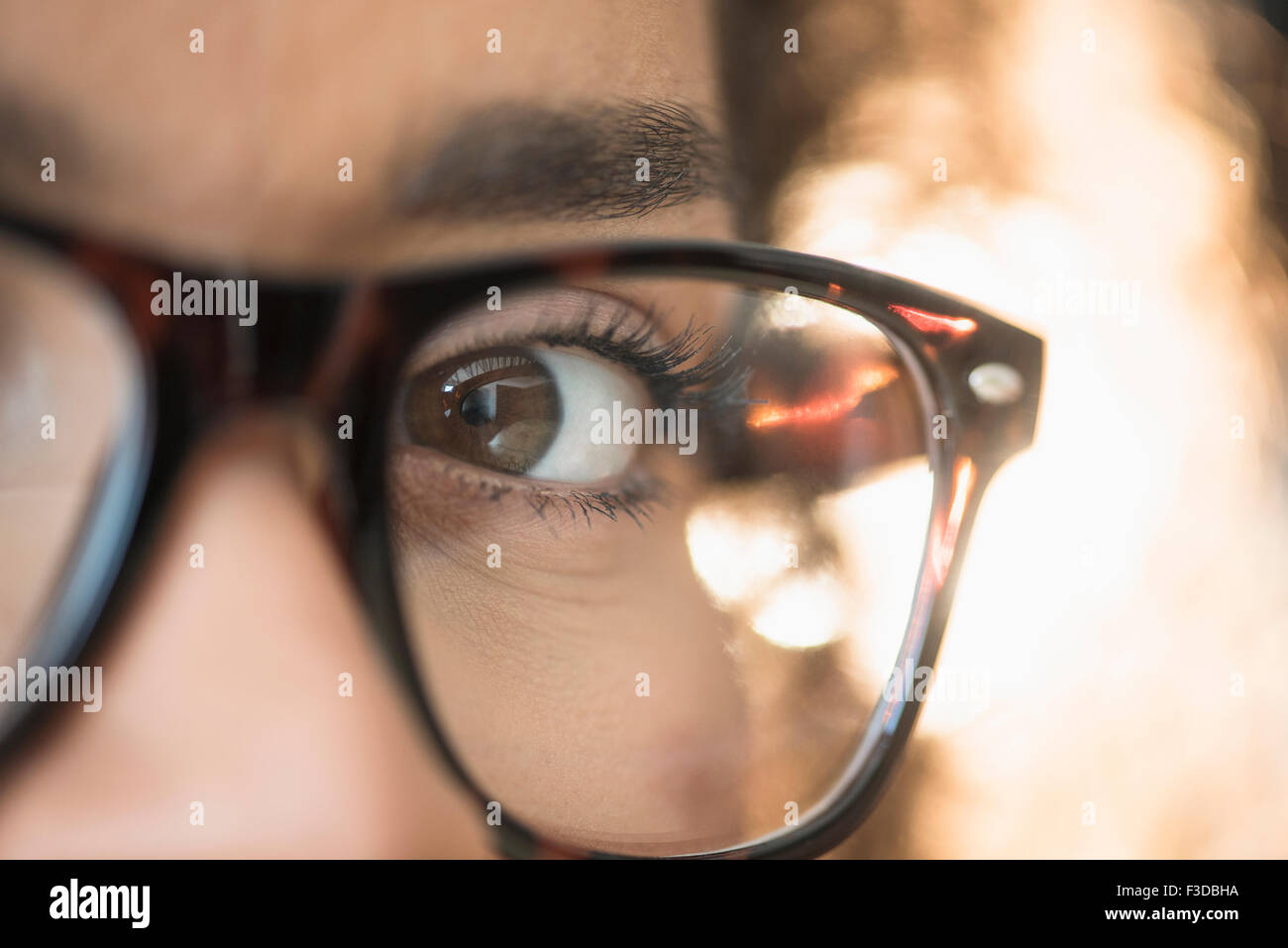 Close up of young woman in nerdy glasses Stock Photo - Alamy