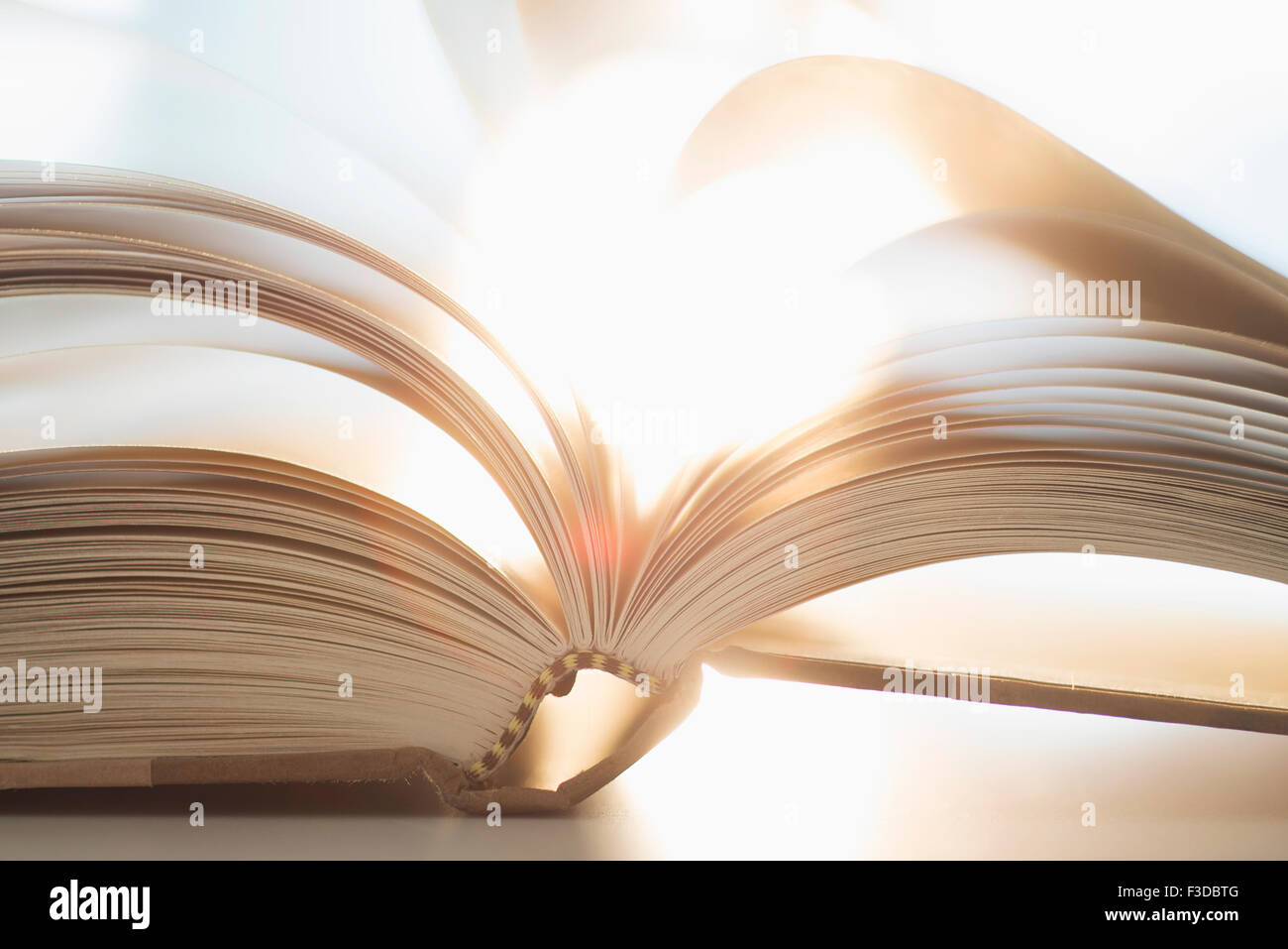 Book on table Stock Photo - Alamy