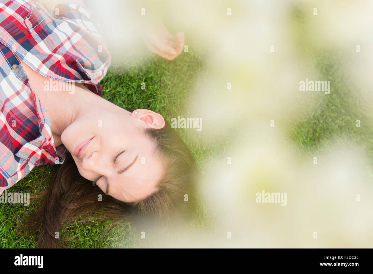 Person lying on the grass hi-res stock photography and images - Alamy