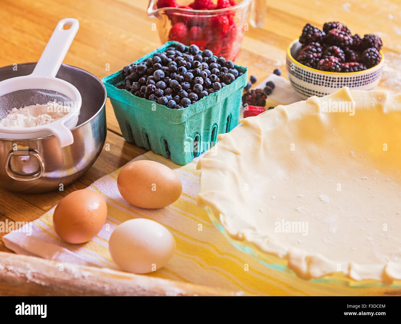 Ingredients for berry pie on table Stock Photo - Alamy