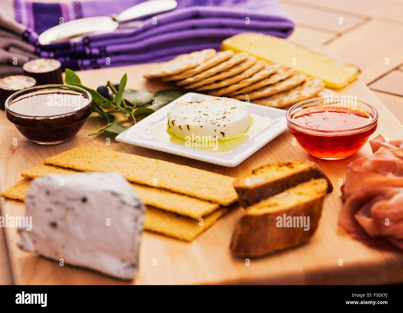 Blue cheese snacks on cutting board Stock Photo - Alamy