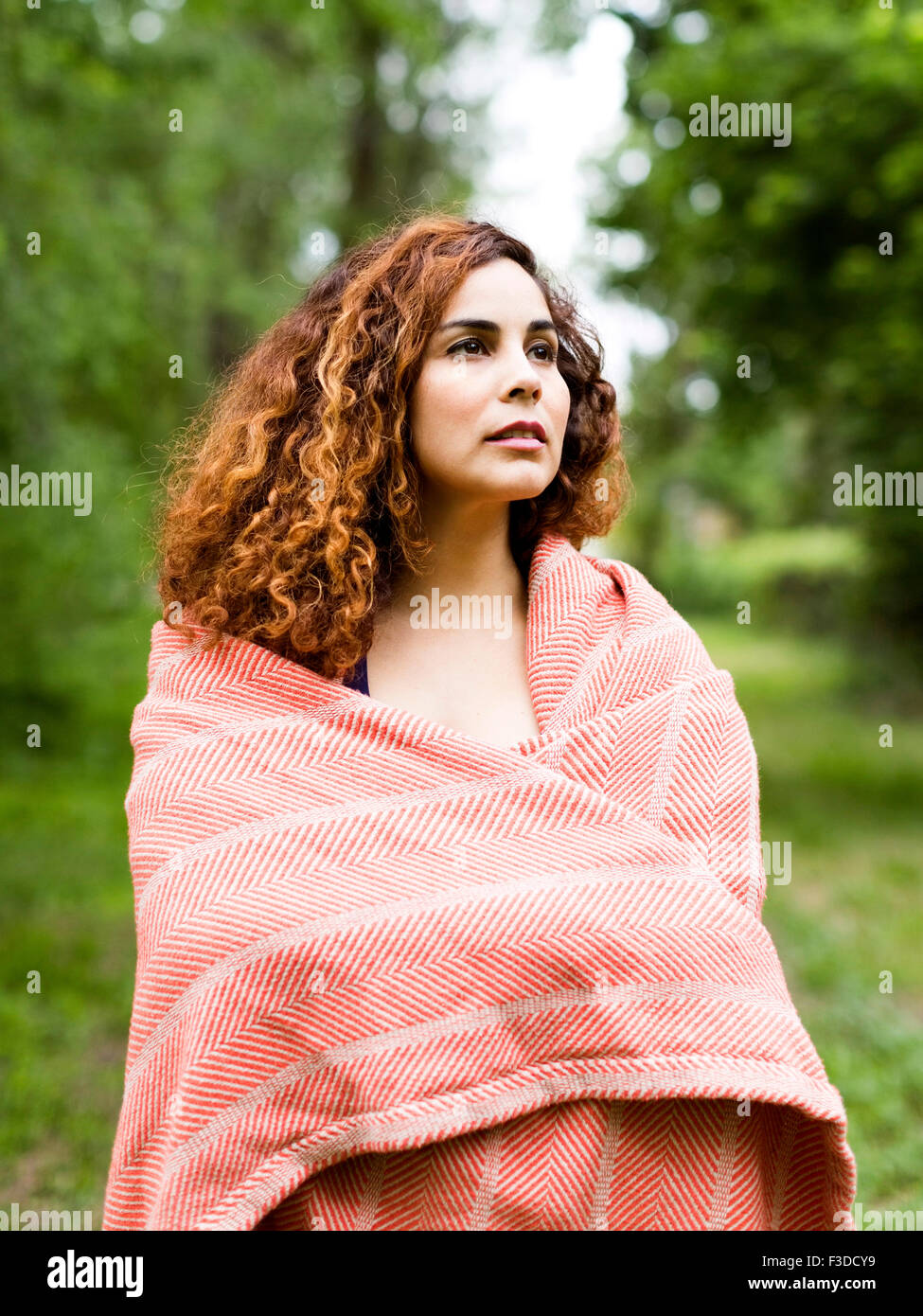 Woman covered with blanket Stock Photo - Alamy