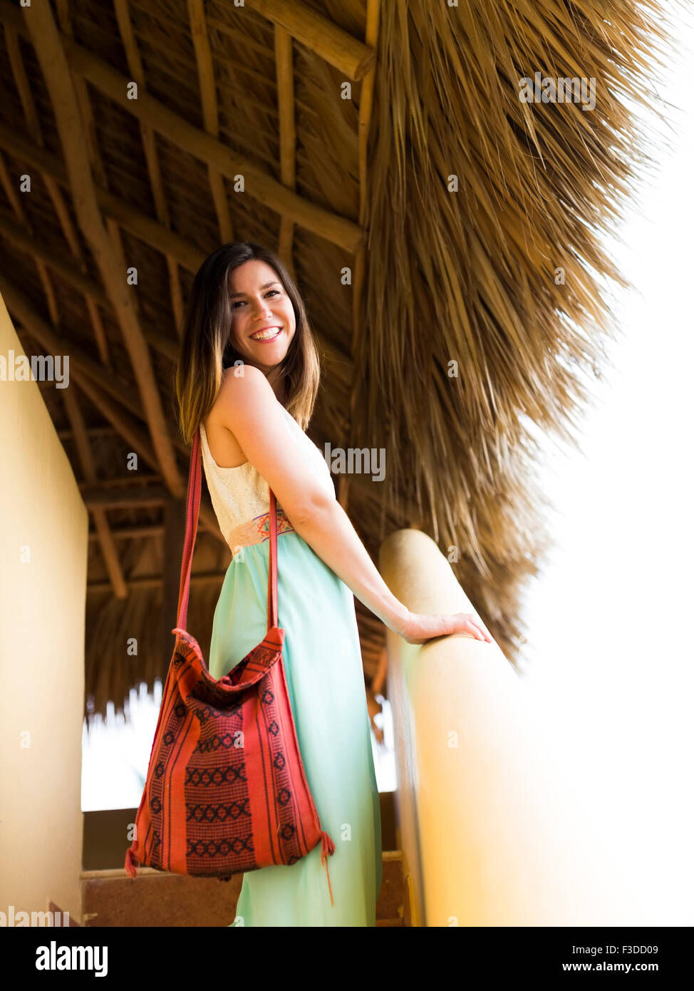 Woman standing on steps hi-res stock photography and images - Alamy
