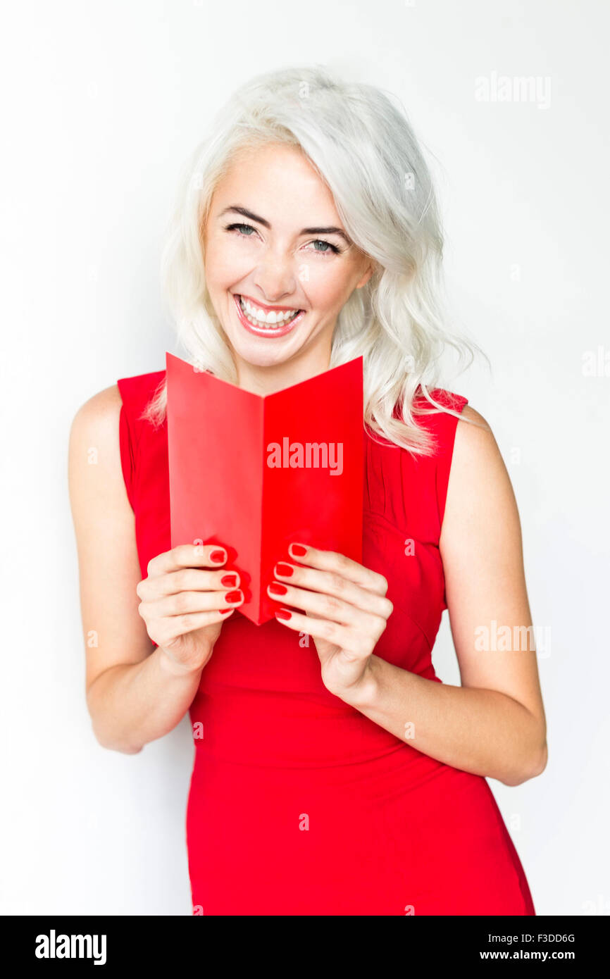 Medium red dress hi-res stock photography and images - Alamy