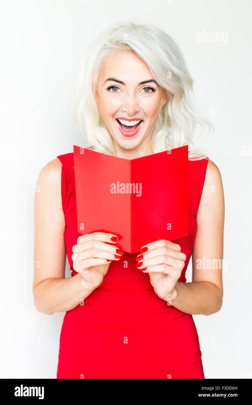 Medium red dress hi-res stock photography and images - Alamy