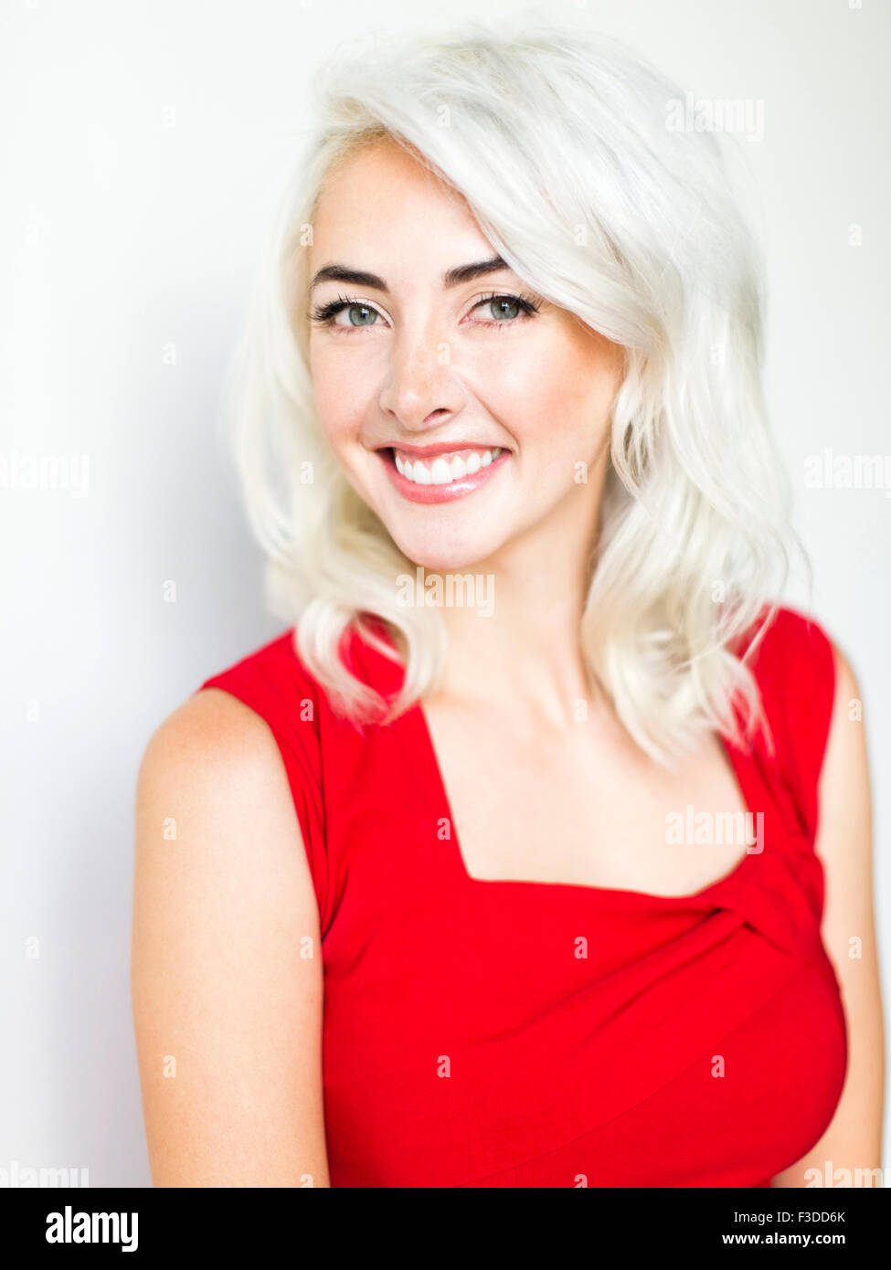 Medium red dress hi-res stock photography and images - Alamy