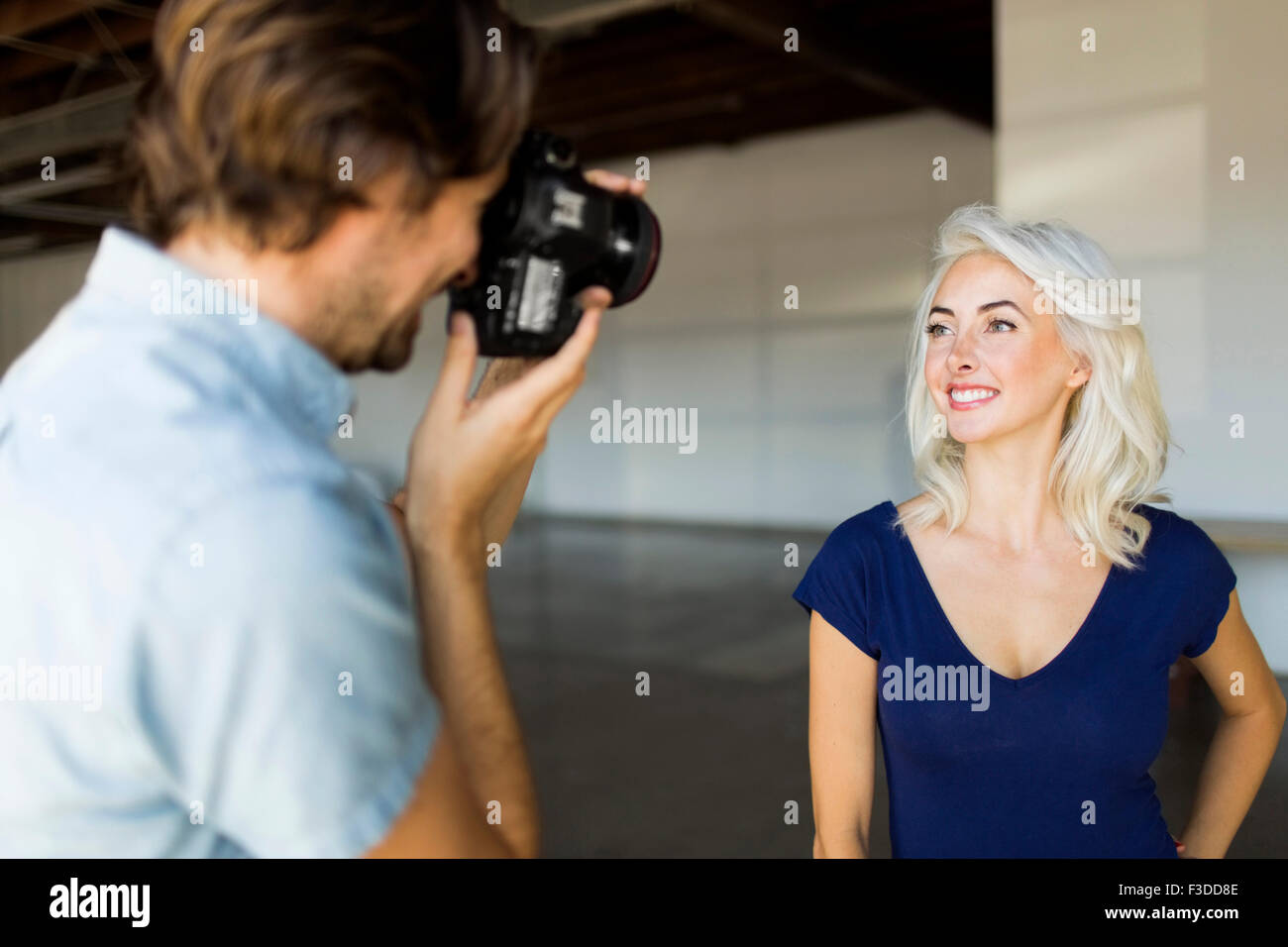 Photographing man woman hi-res stock photography and images - Alamy