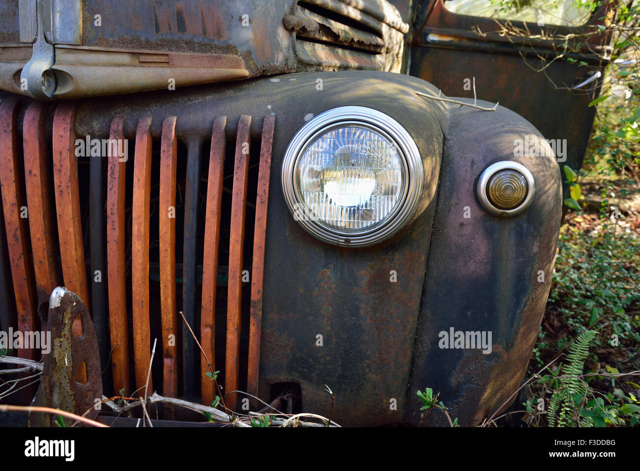 Front of rusty abandoned car Stock Photo - Alamy