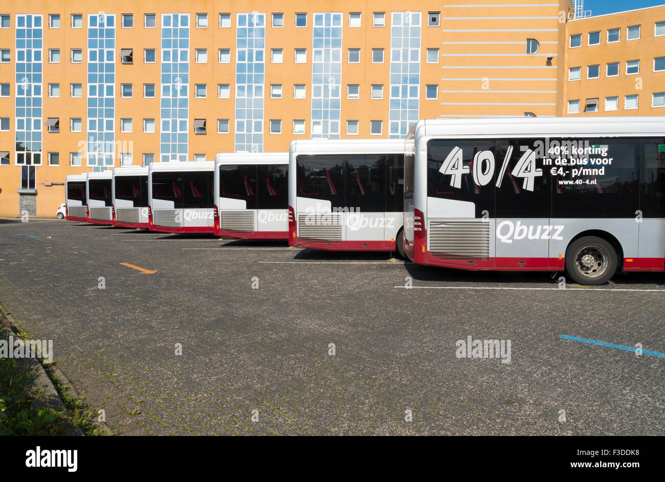 GRONINGEN, NETHERLANDS - AUGUST 22, 2015: Line of city buses at the ...