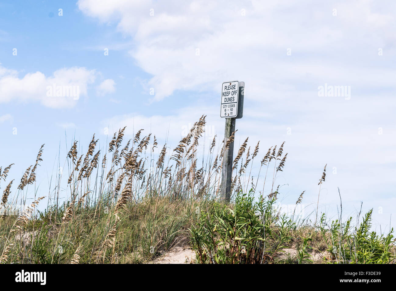 Sign warning sand dunes hi-res stock photography and images - Alamy