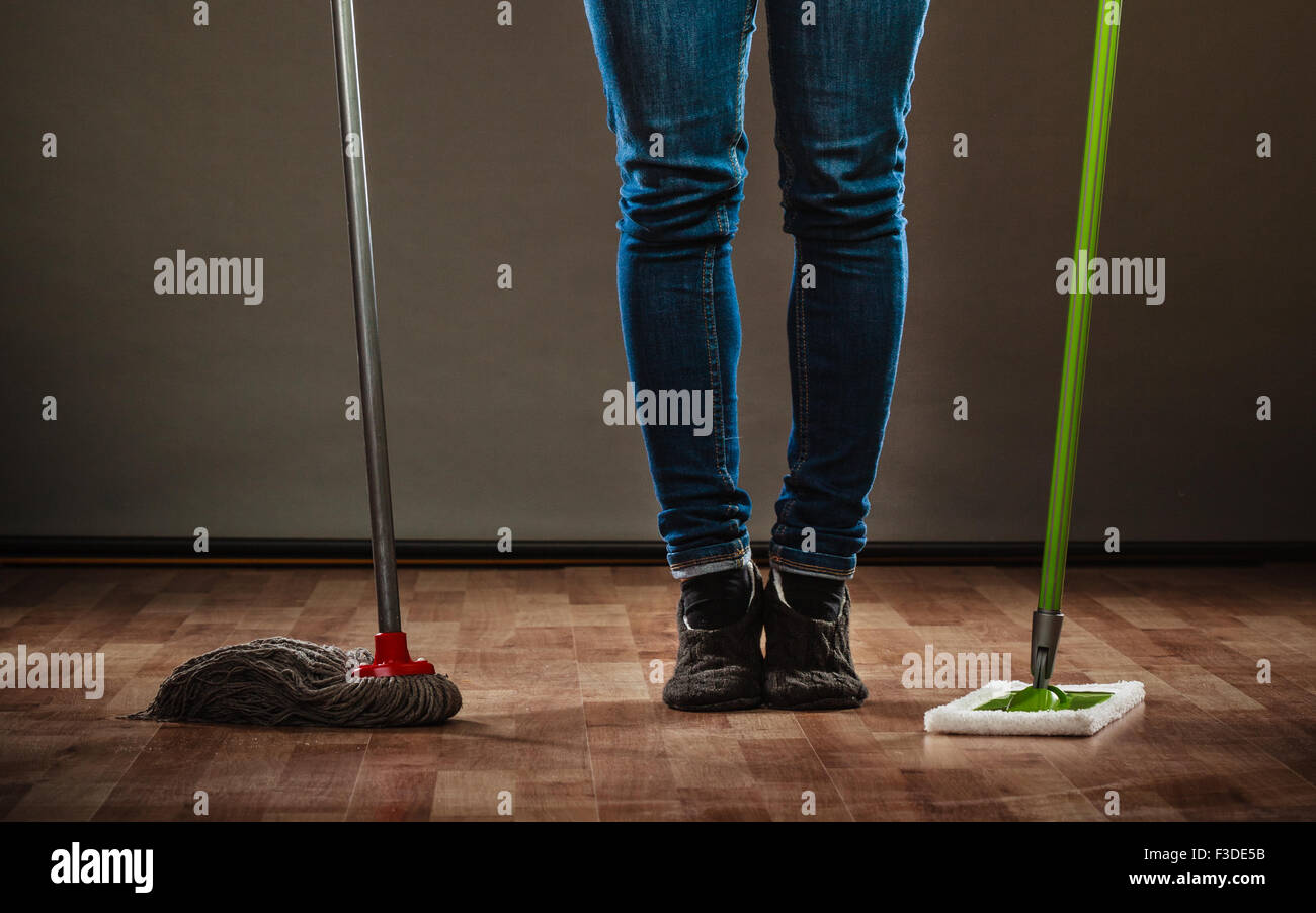 Cleanup housework concept. Cleaning woman legs, girl mopping floor ...