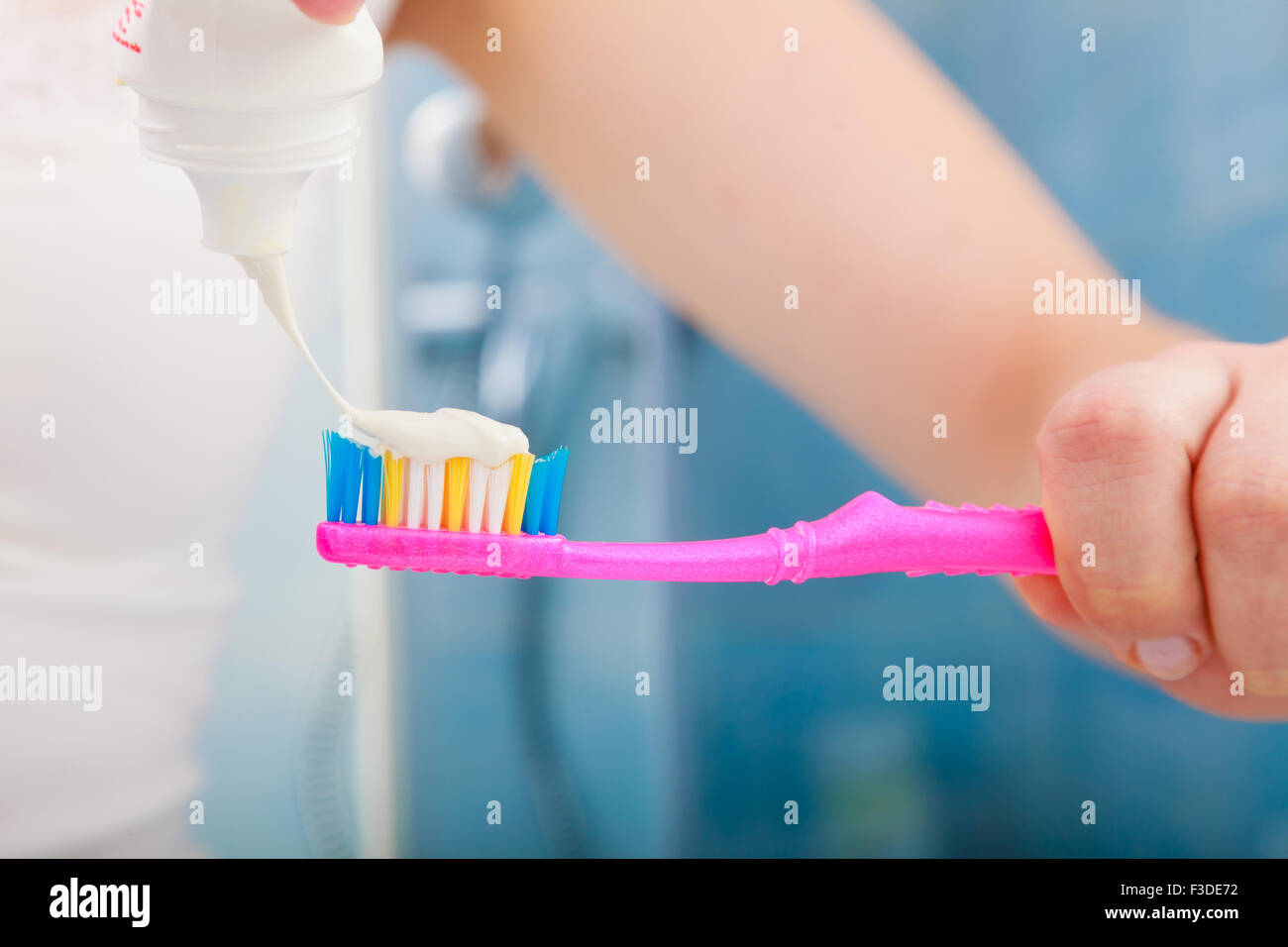 Dental health care. Closeup woman hands is holding toothbrush and ...