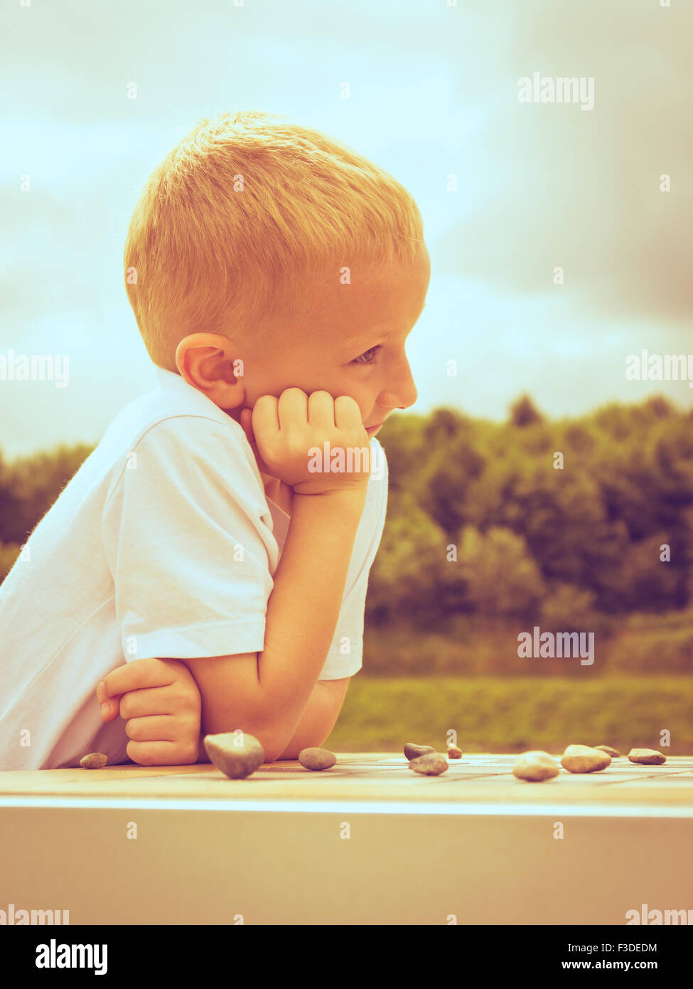 Draughts board game. Little boy clever child kid playing checkers ...