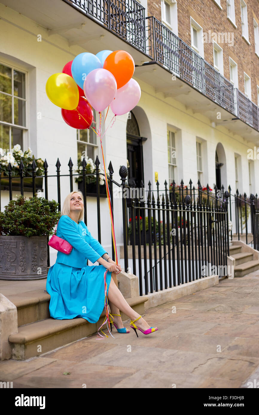 Balloon woman sitting hi-res stock photography and images - Alamy