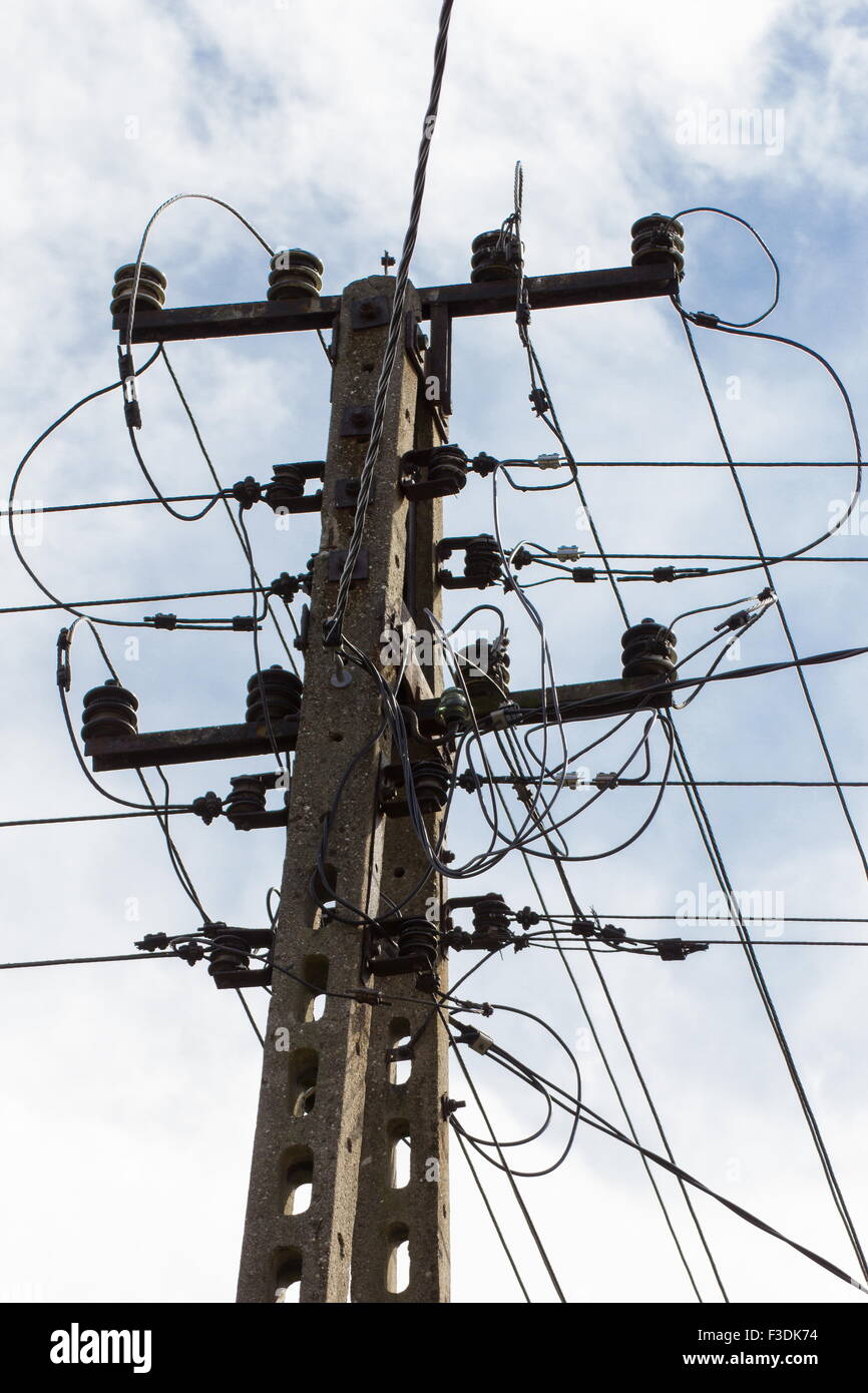 Old wooden electric pole with wires, line of electricity transmissions ...