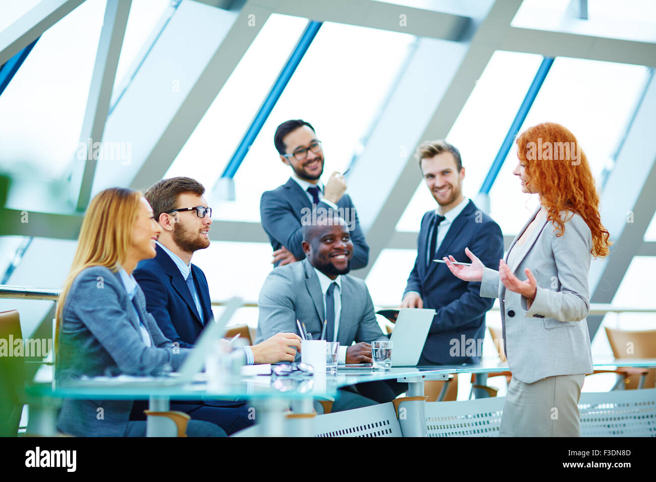 Modern employees voicing their opinions upon new ideas Stock Photo - Alamy