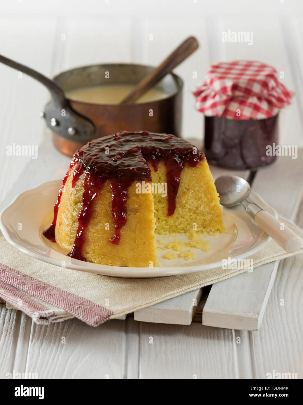 Steamed jam pudding. Traditional dessert UK Stock Photo - Alamy