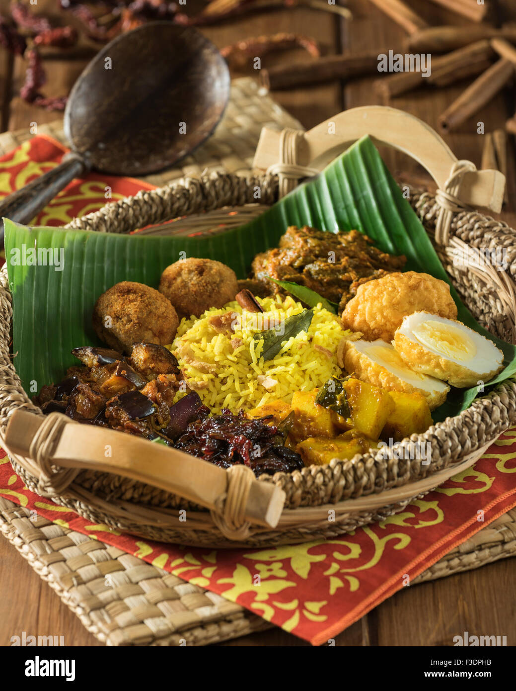 Lamprais. Curry, rice and vegetables in banana leaf. Sri Lanka Food ...