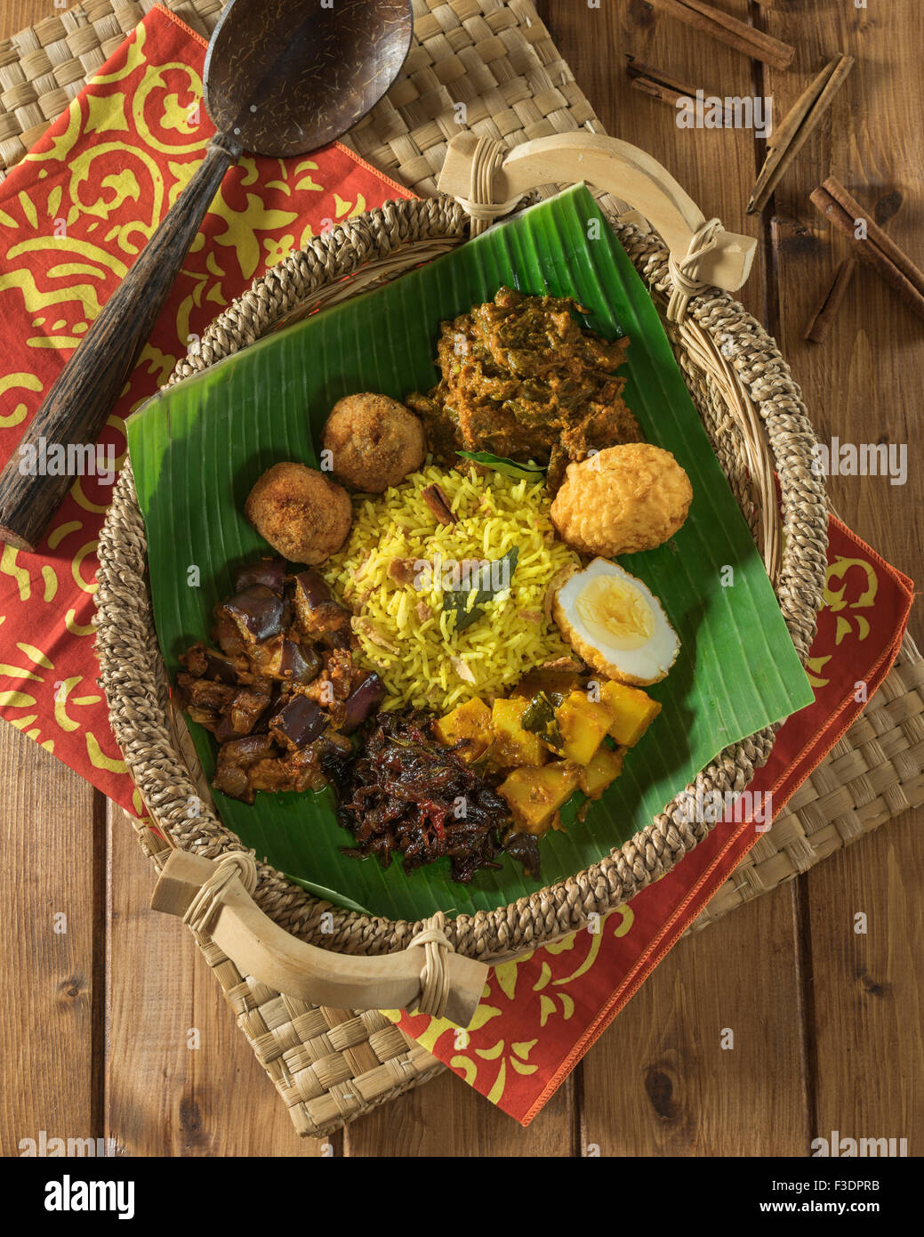 Lamprais. Curry, rice and vegetables in banana leaf. Sri Lanka Food ...