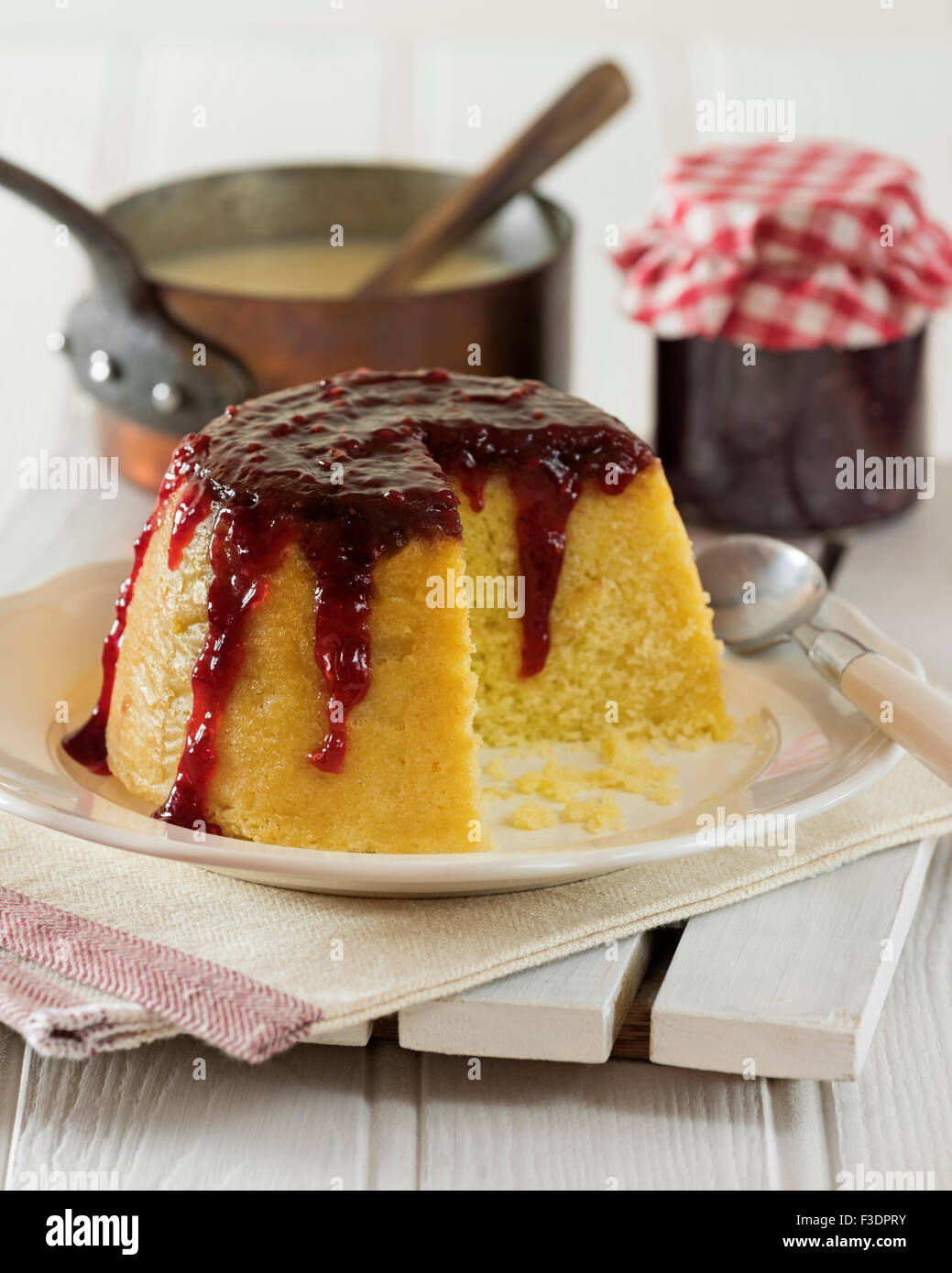 Steamed jam pudding. Traditional dessert UK Stock Photo - Alamy