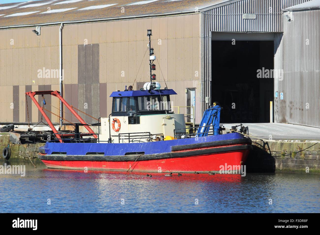 Small boat moored in the Lower Basin at Glasson Dock near Lancaster ...