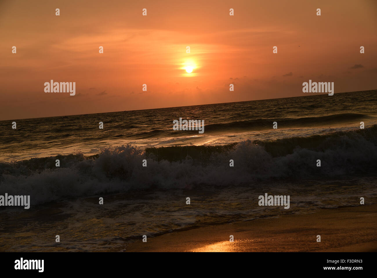 Sunset over ocean and beach in Kerala India.Bekal fort beach Kasargode ...