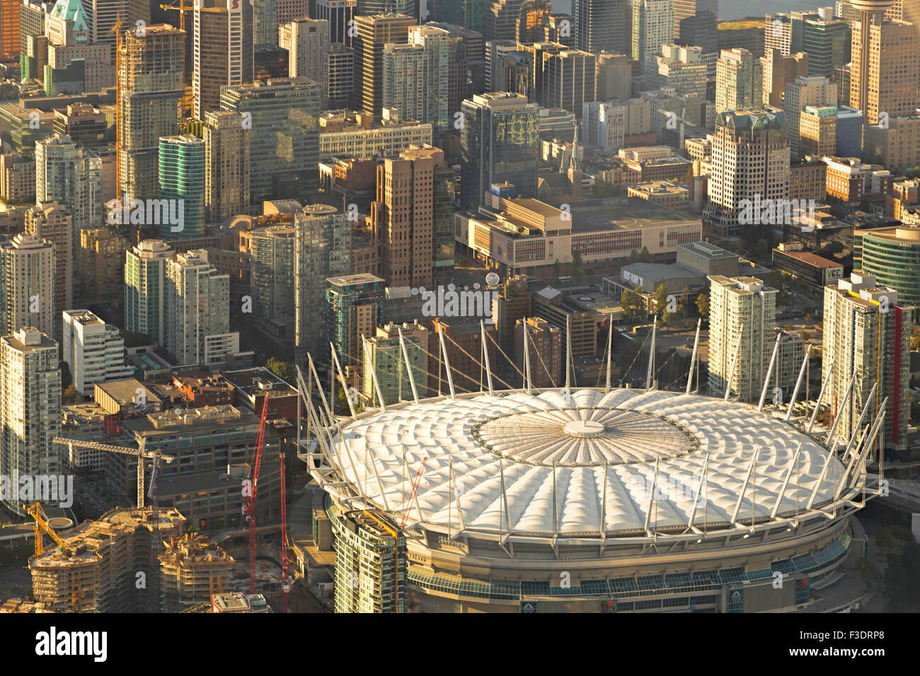 Aerial view from a seaplane on BC Place Stadium and the skyline of ...