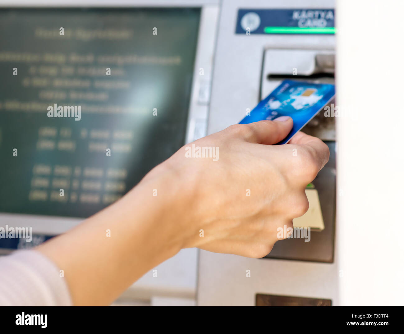 Female hand - close up - cash withdrawals at ATMs Stock Photo - Alamy