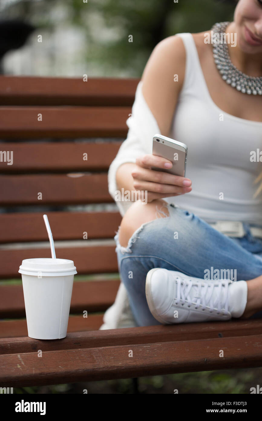 beautiful girl on the street corresponded by phone Stock Photo - Alamy
