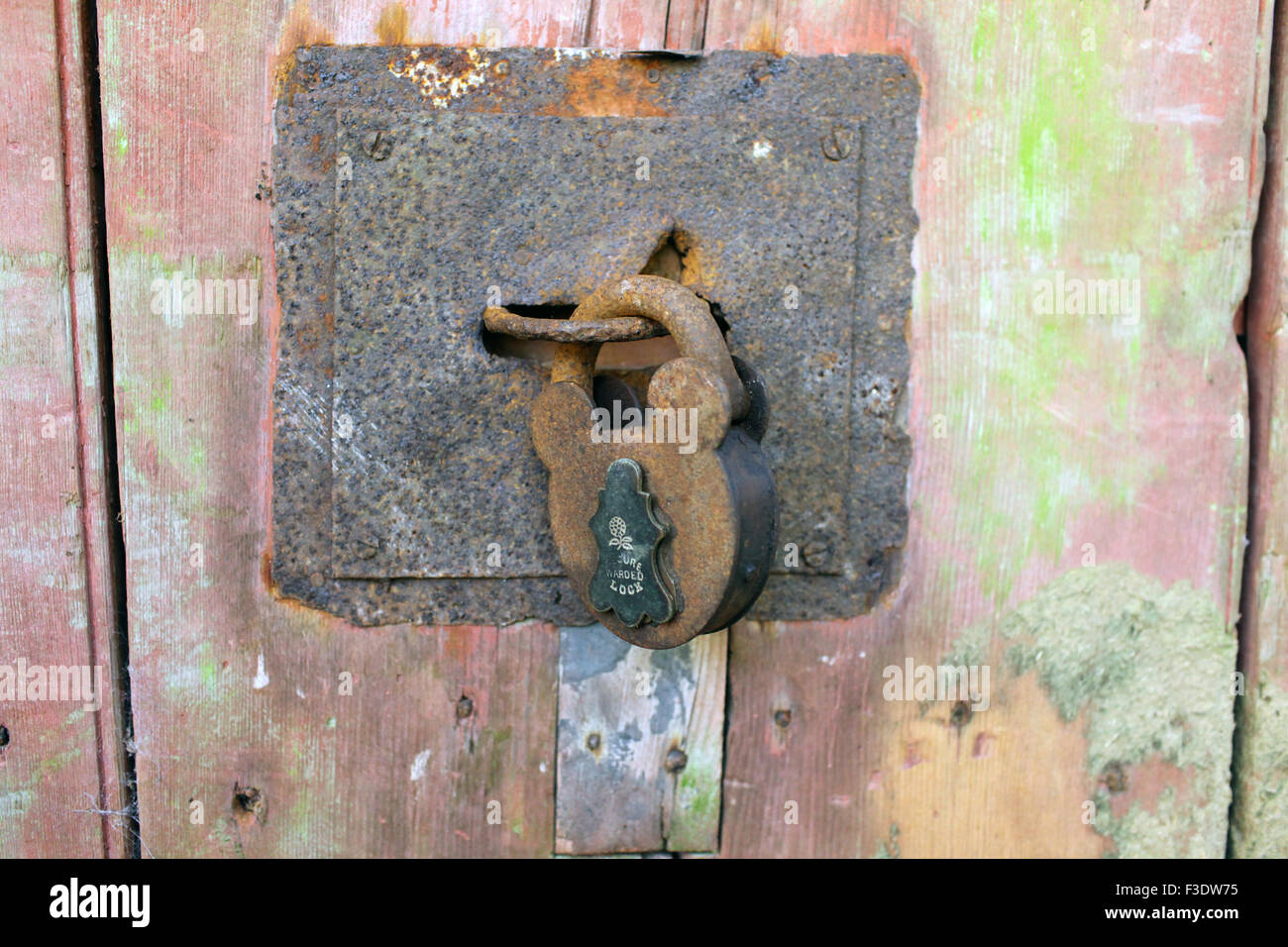 Rusty barn padlock Stock Photo - Alamy