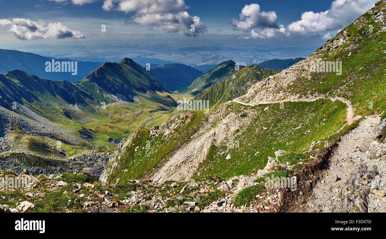 Majestic view of a lake between mountain ridges Stock Photo - Alamy