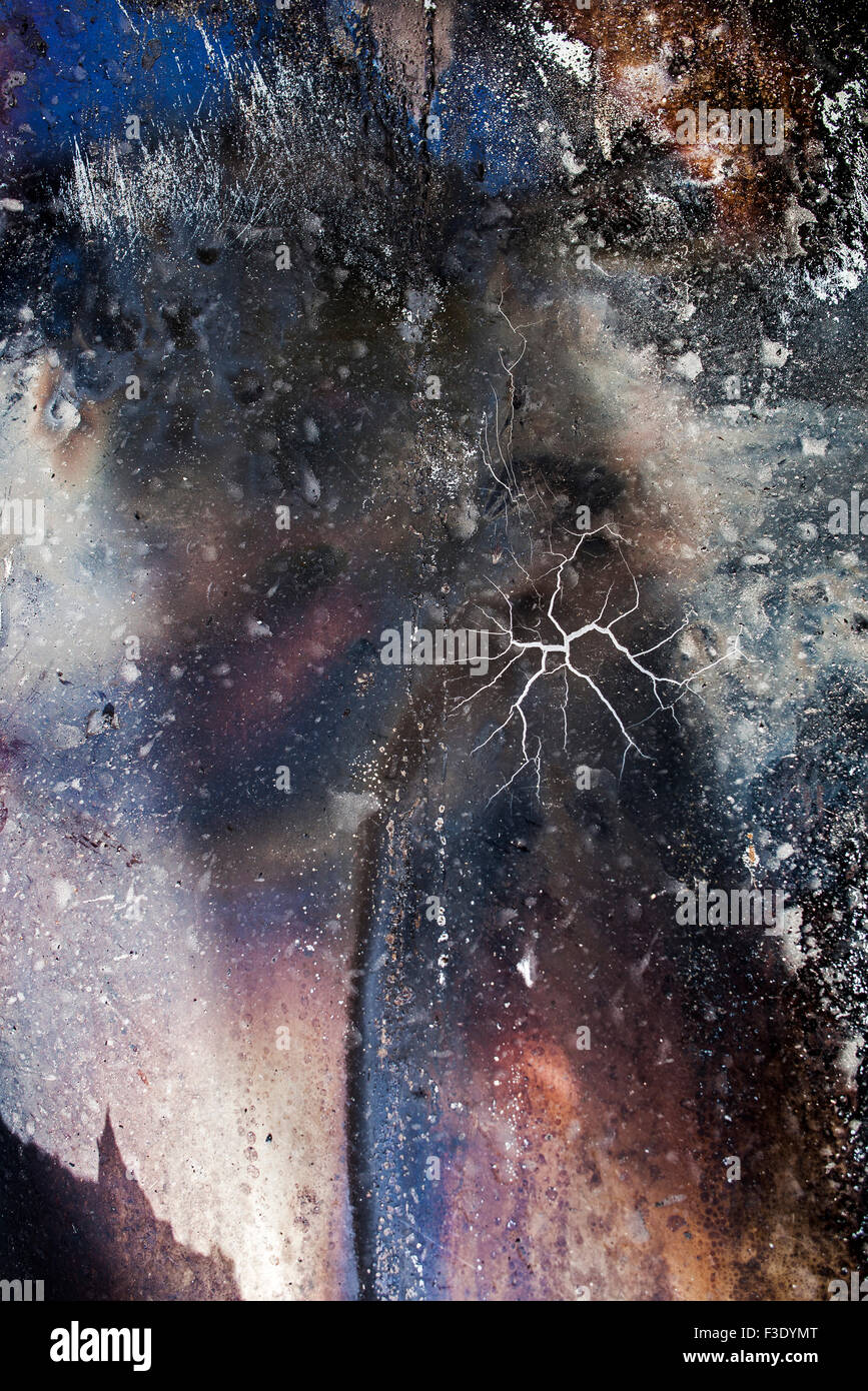 Cracked, scorched stained glass window Stock Photo - Alamy
