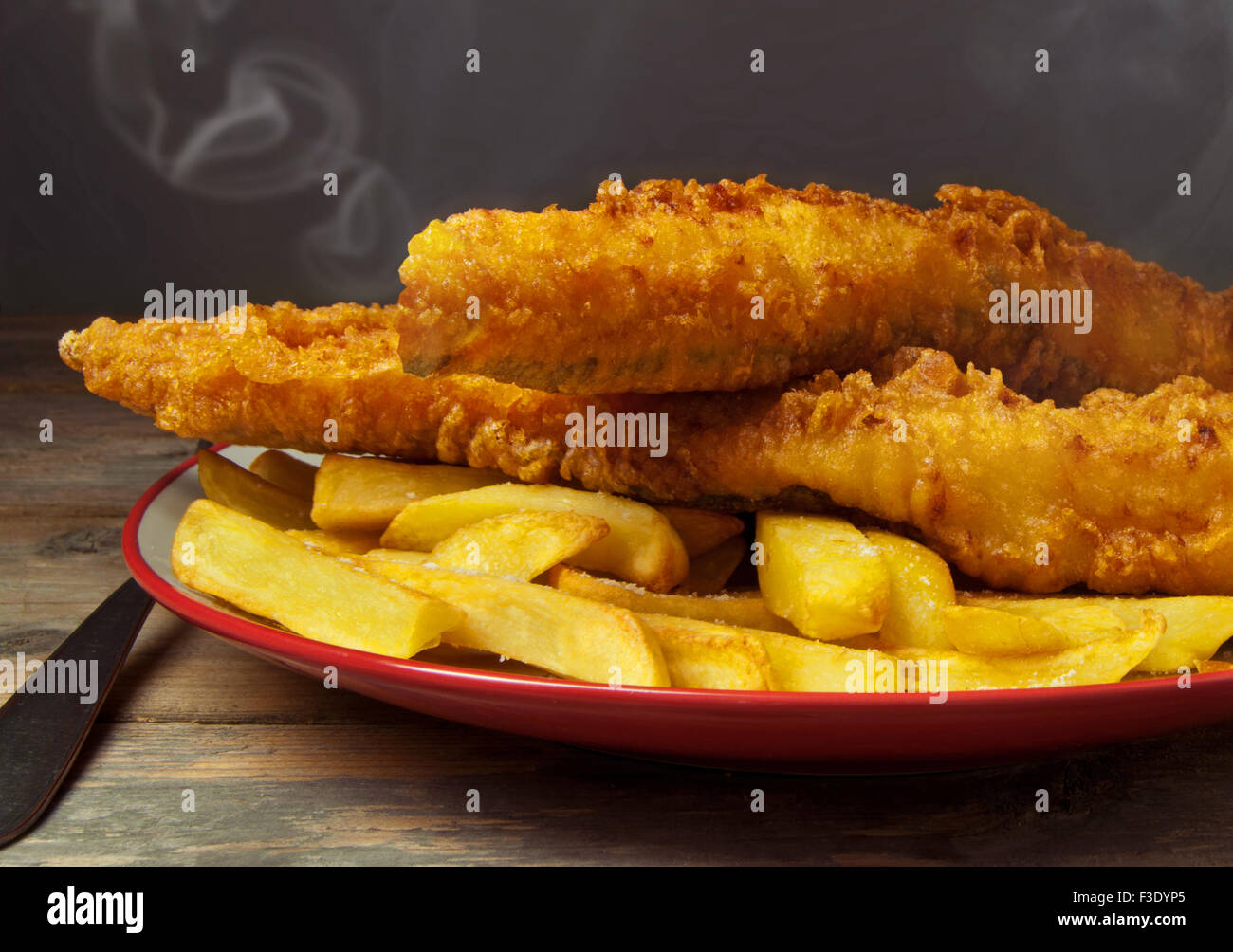 Close up of freshly made fish and chips Stock Photo - Alamy