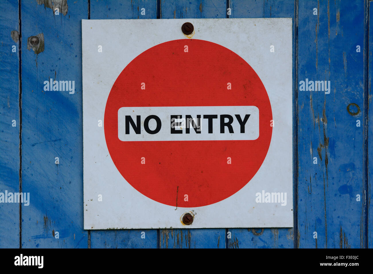 NO ENTRY sign on blue door Stock Photo - Alamy