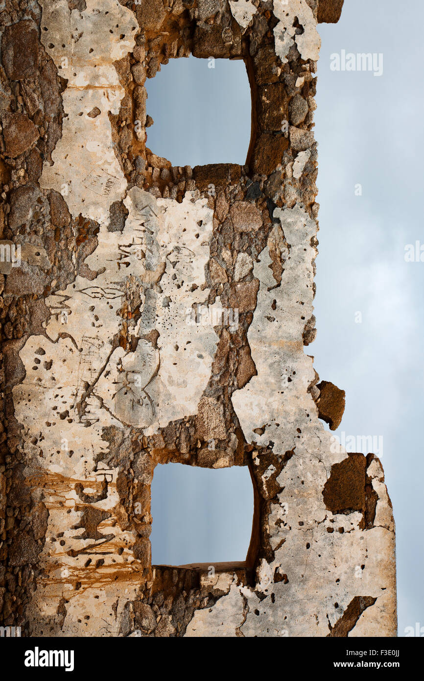 brown distorted door window in a broke paint wall arrecife lanzarote ...