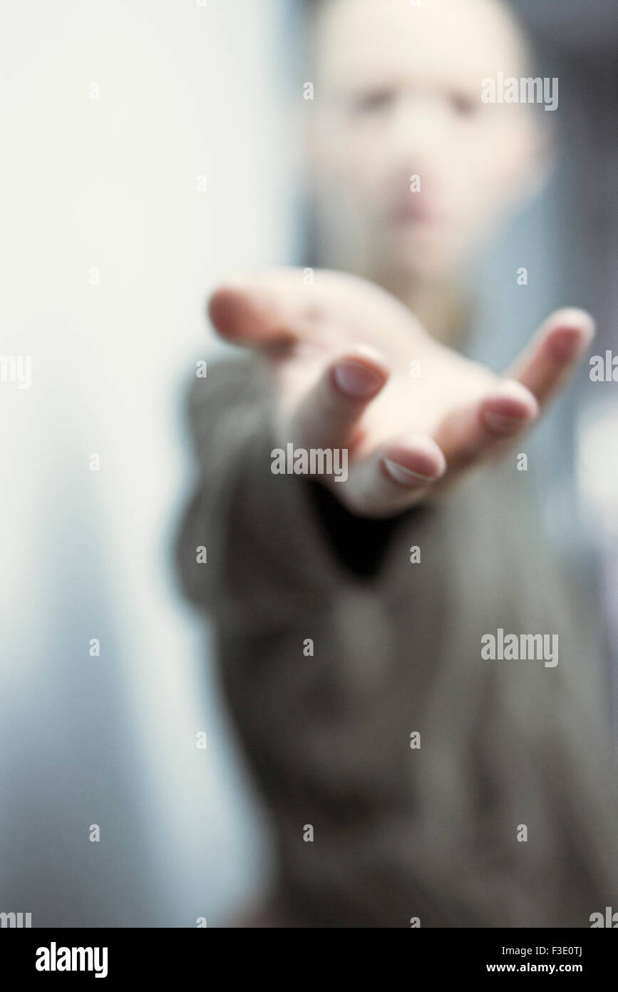 Woman extending hand in invitation to join, personal perspective Stock ...
